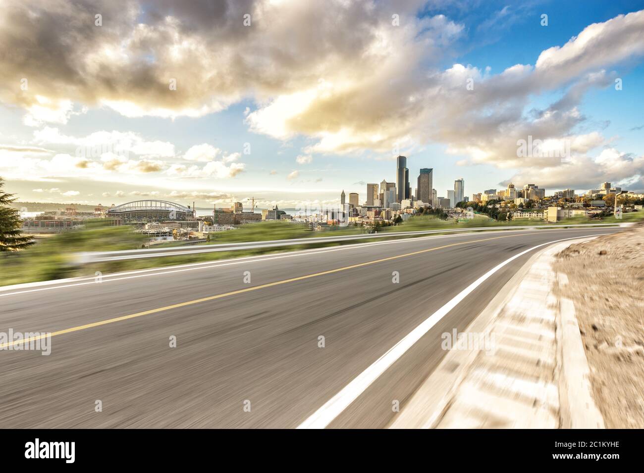 empty asphalt highway through modern city Stock Photo - Alamy