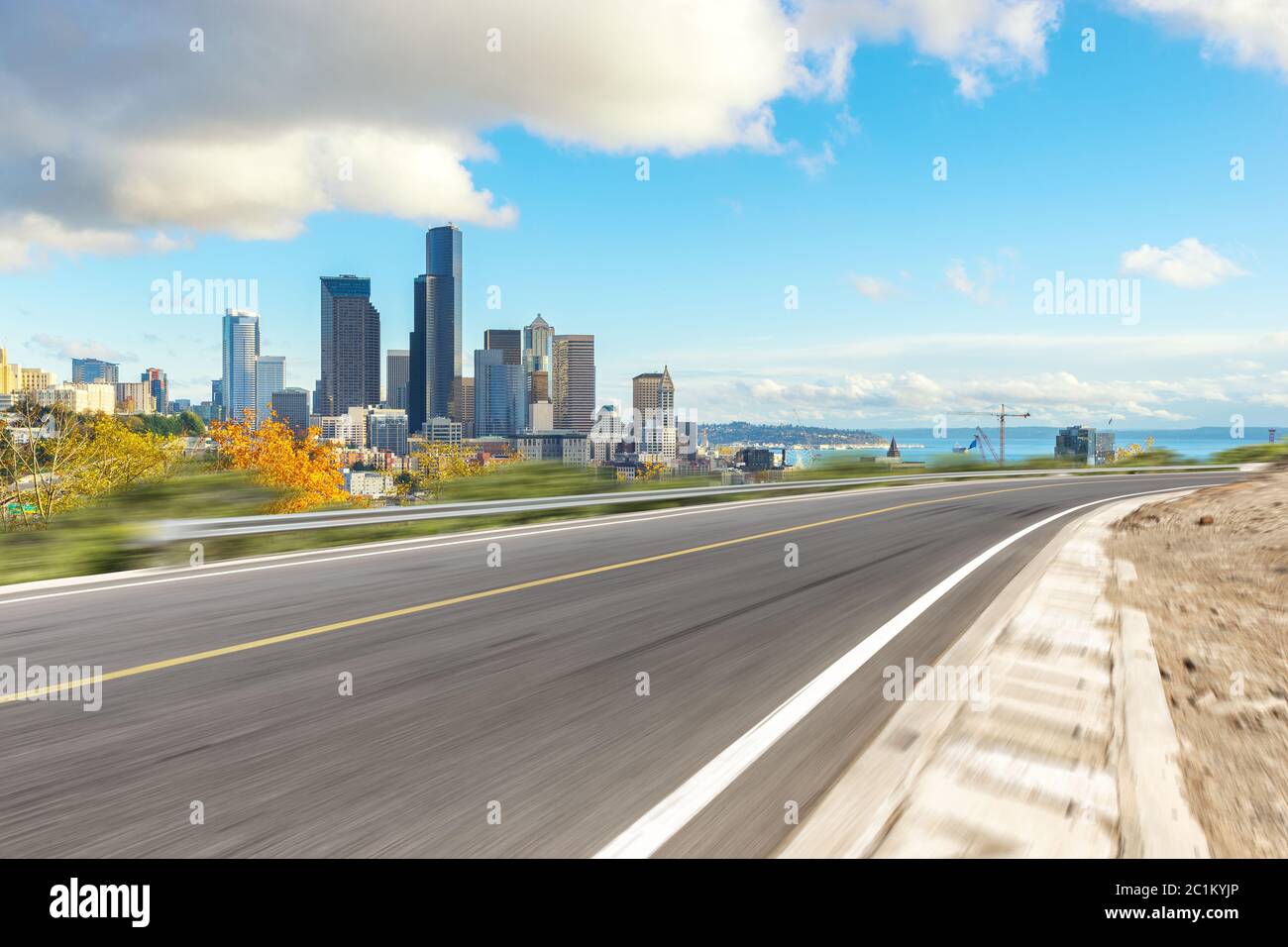 empty asphalt highway through modern city Stock Photo - Alamy