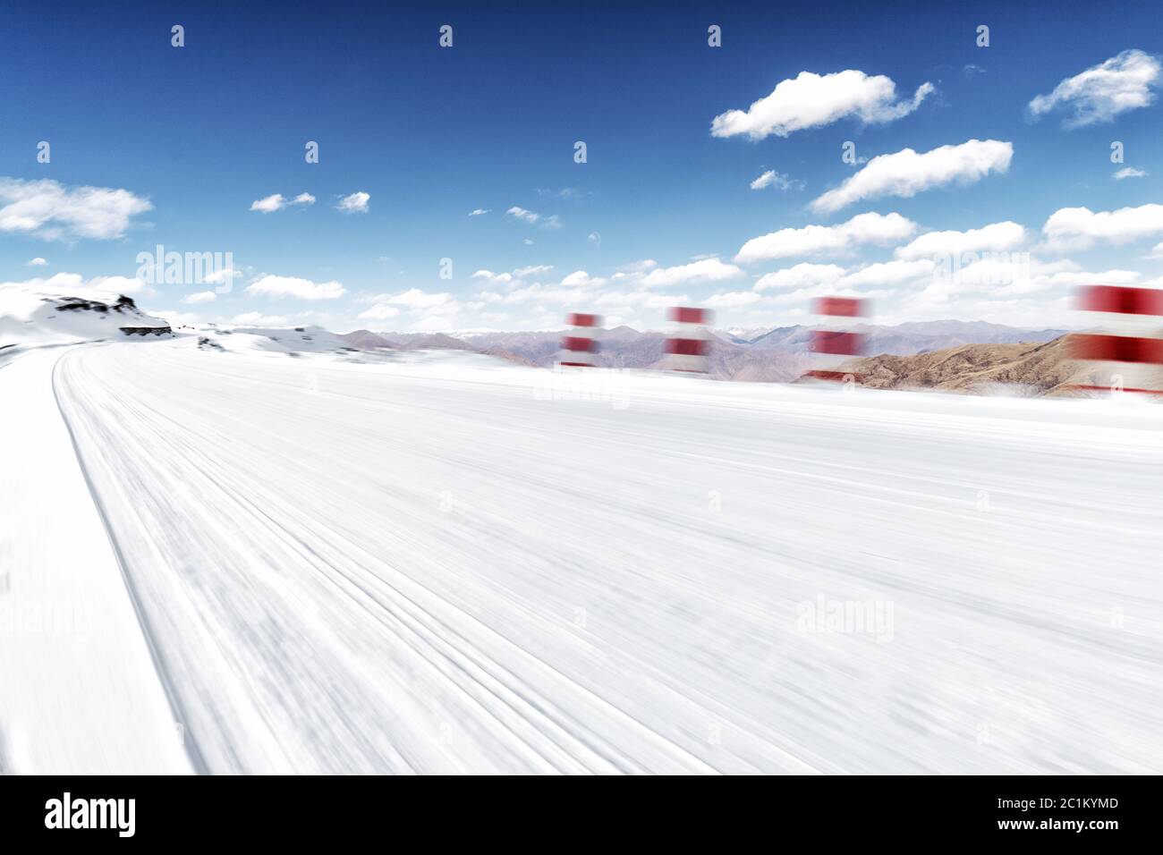 highway covered snow through mountain Stock Photo - Alamy