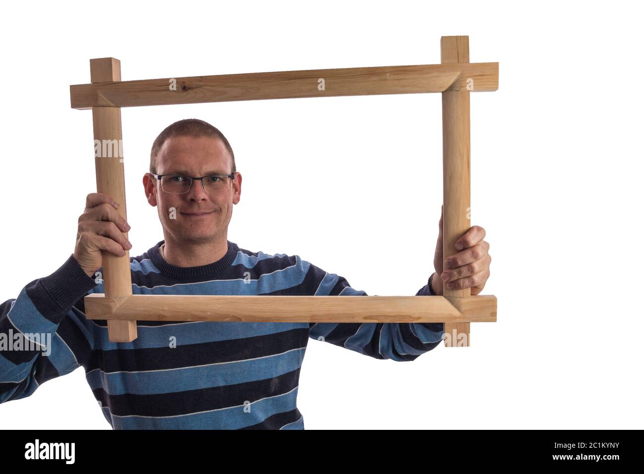 Man holds frame Stock Photo - Alamy