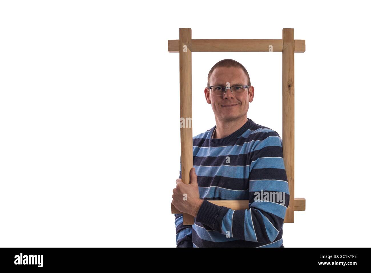 Man holds frame Stock Photo - Alamy