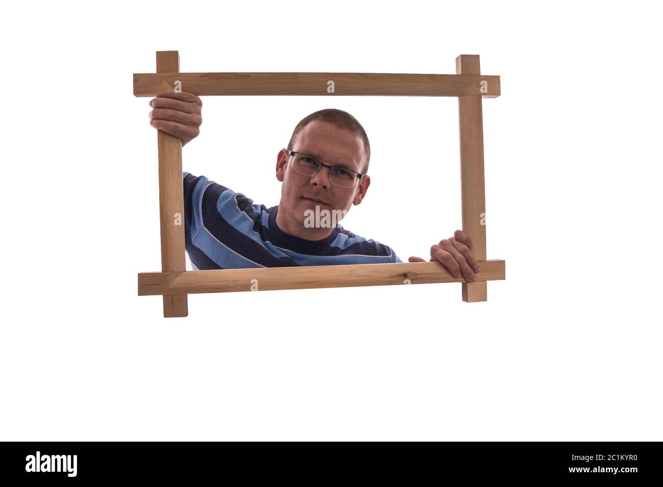 Man holds frame Stock Photo - Alamy