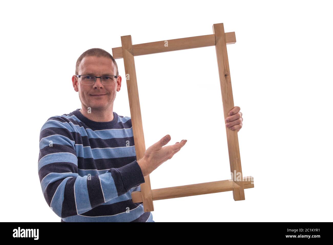 Man holds frame Stock Photo - Alamy