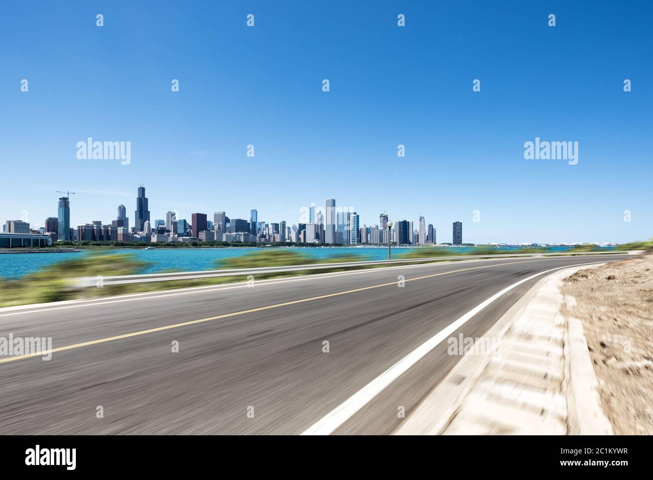 empty asphalt highway through modern city Stock Photo - Alamy
