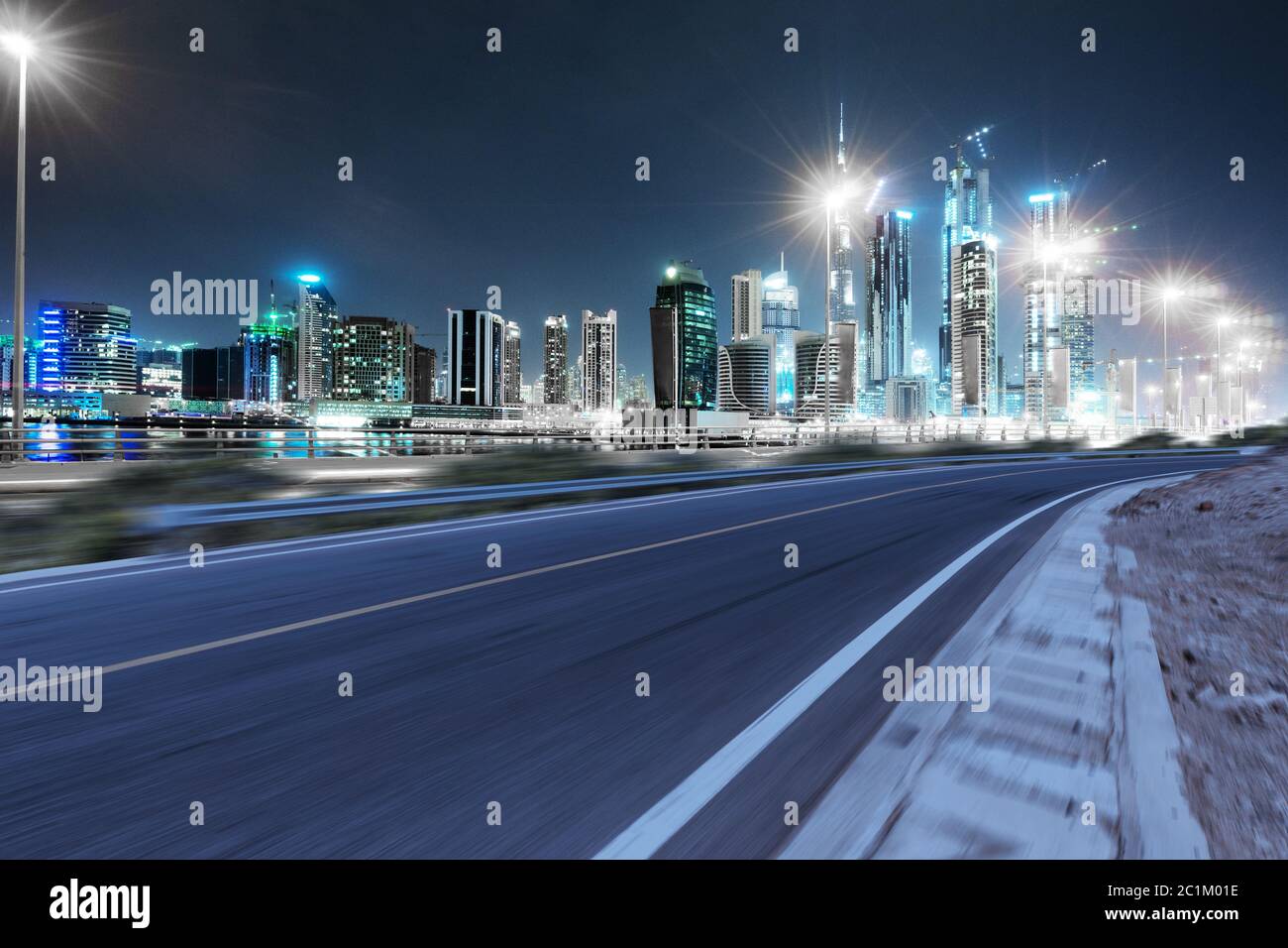 empty asphalt highway through modern city Stock Photo - Alamy