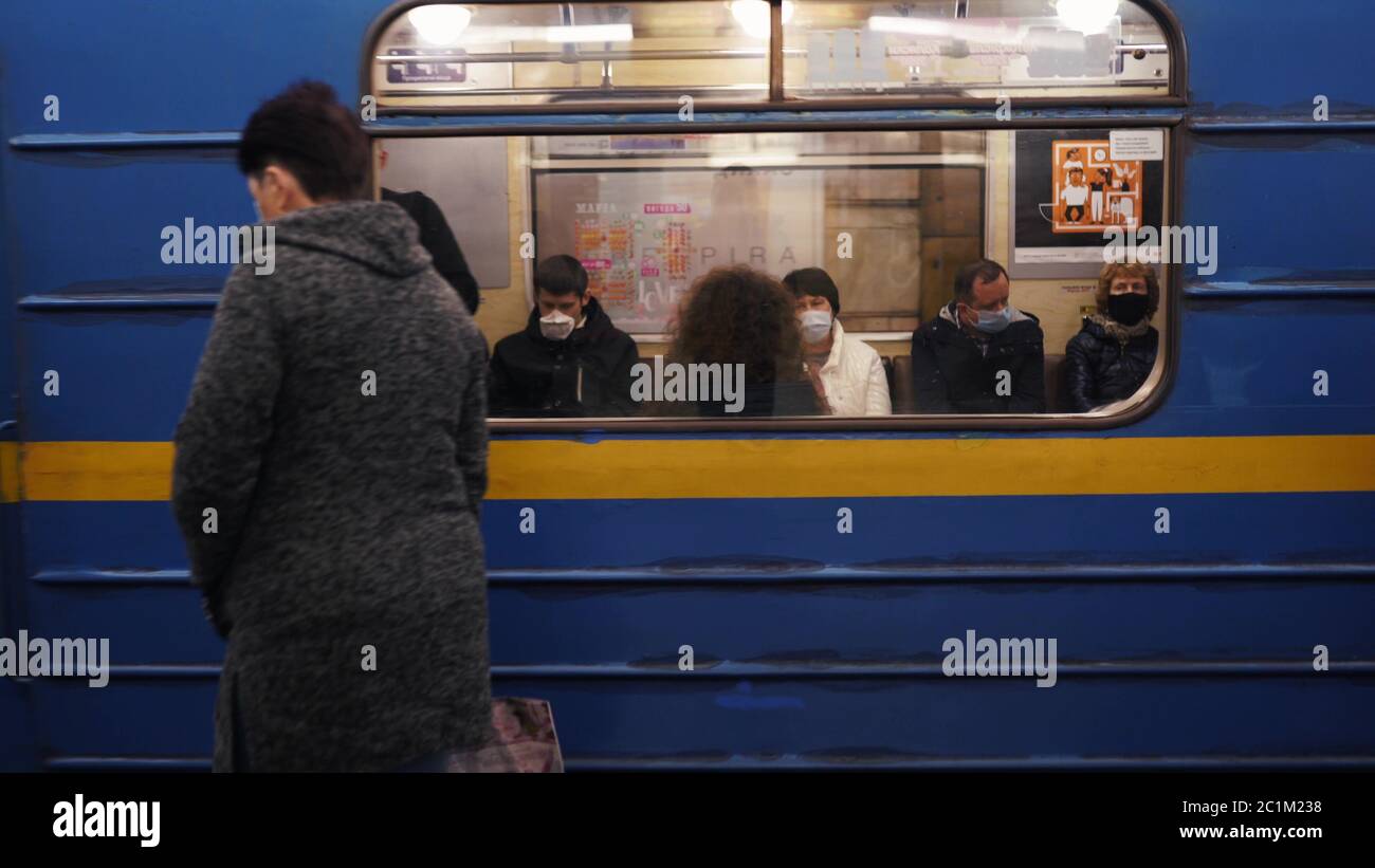 UKRAINE, KIEV - MAY 26, 2020: subway station. People in a subway car ...