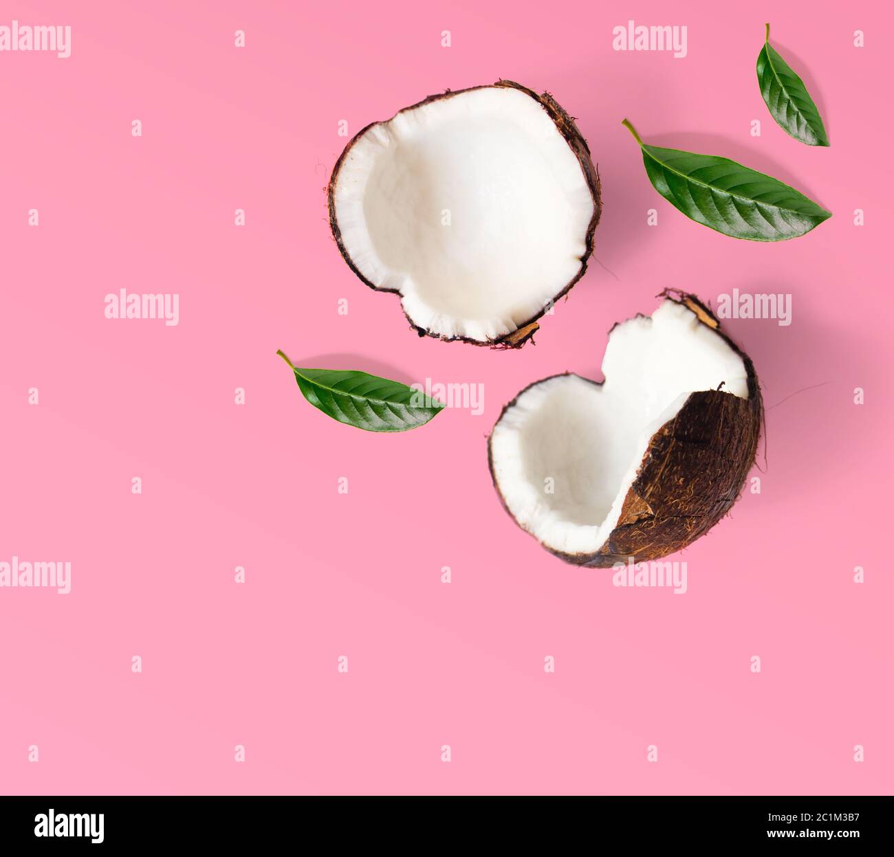 Creative layout made of coconuts and leaves. Flat lay. Food concept ...