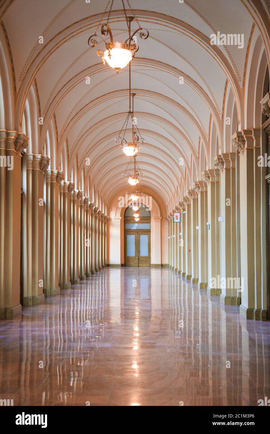 ancient white corridor with arch in budapest Stock Photo - Alamy