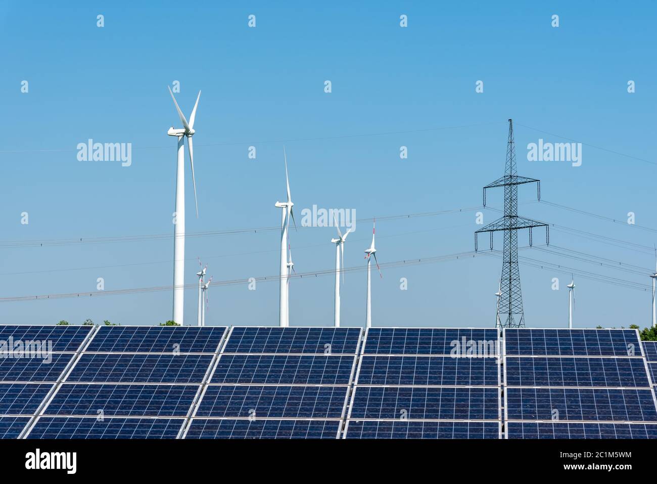 Electricity pylons, solar panels and wind turbines seen in Germany ...