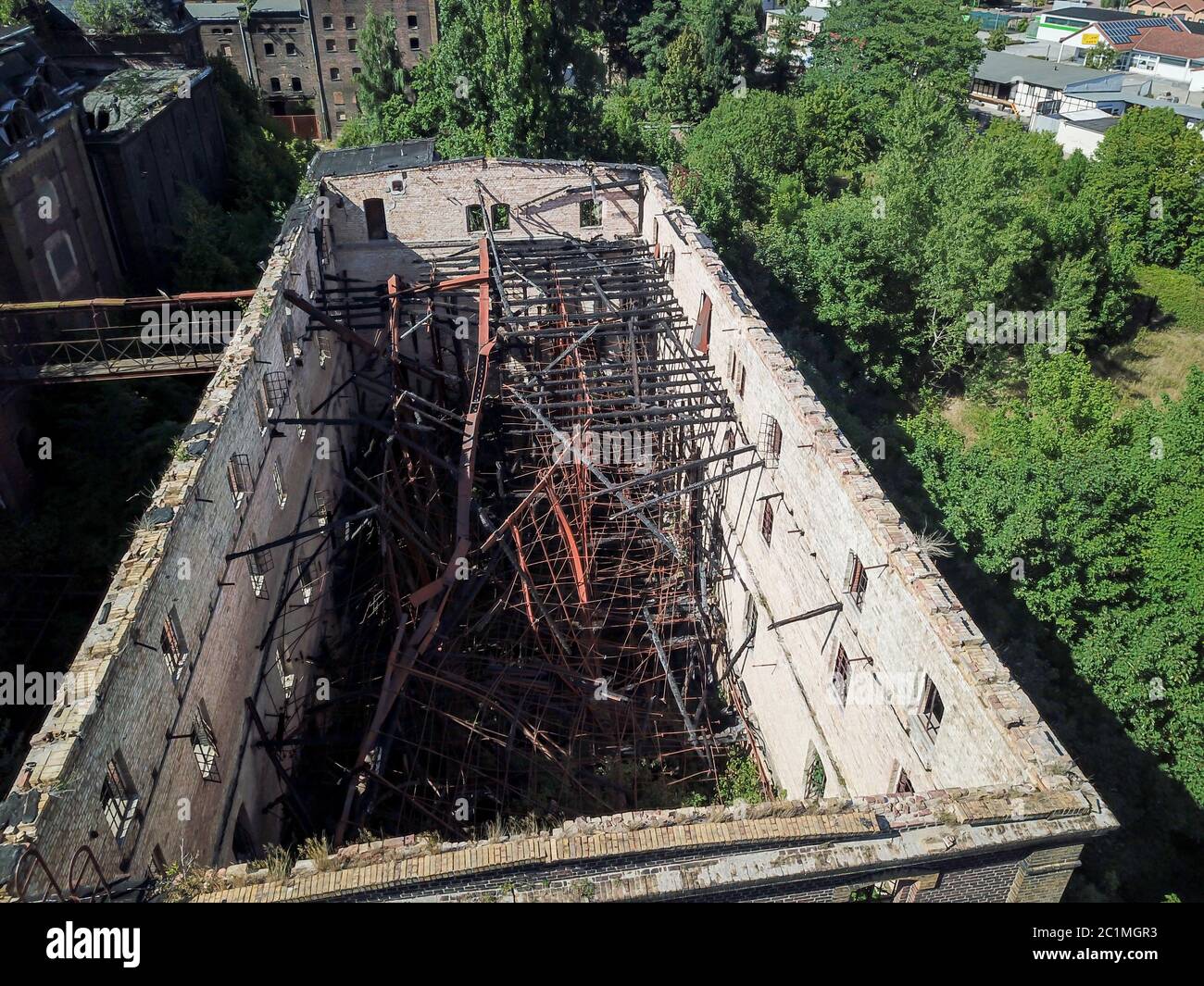 look into a collapsed factory Stock Photo - Alamy