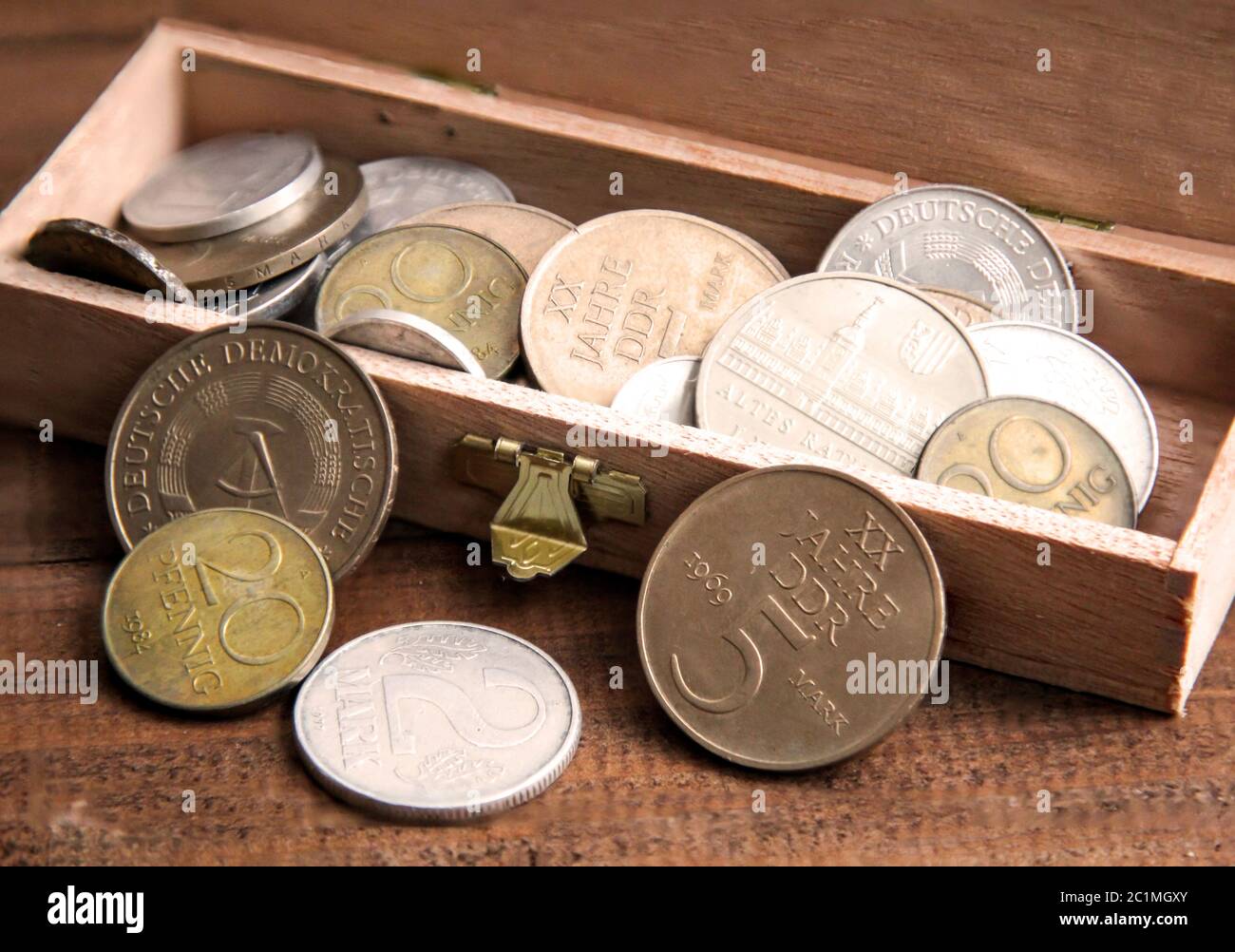 Coins in a Box Stock Photo - Alamy