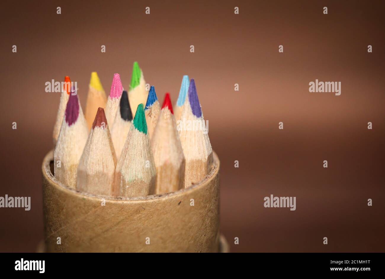 Colored pencils and pencils in rank and file Stock Photo - Alamy