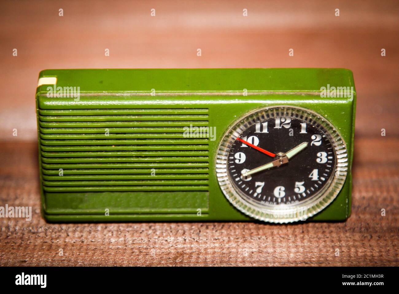 Detail of an old travel alarm clock Stock Photo - Alamy