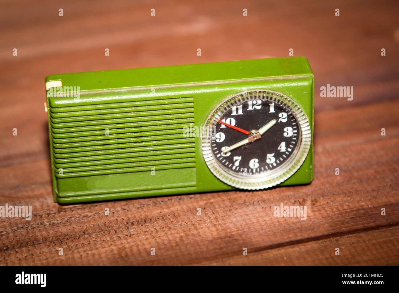 Detail of an old travel alarm clock Stock Photo - Alamy
