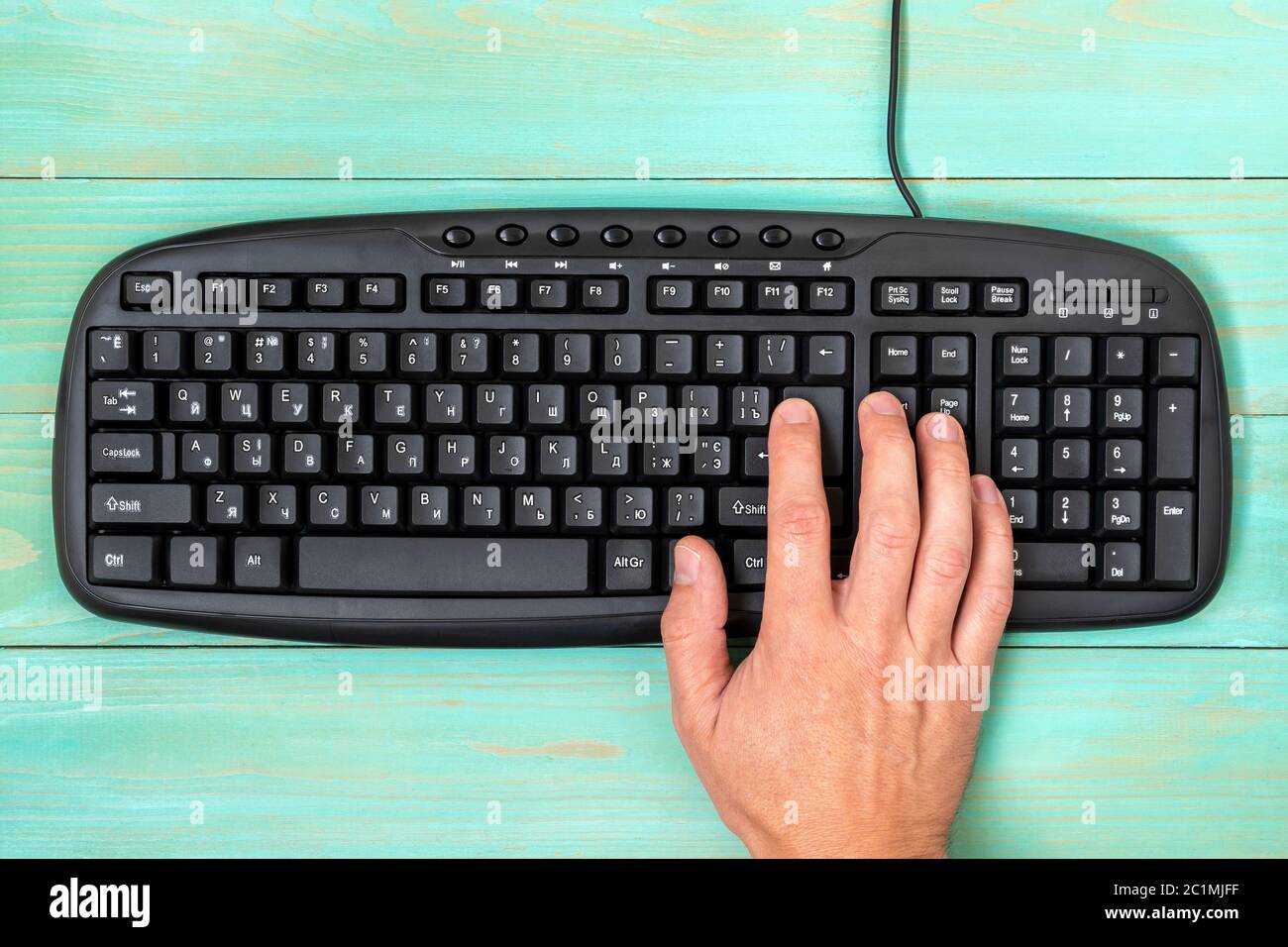 Hand typing computer keyboard Stock Photo - Alamy