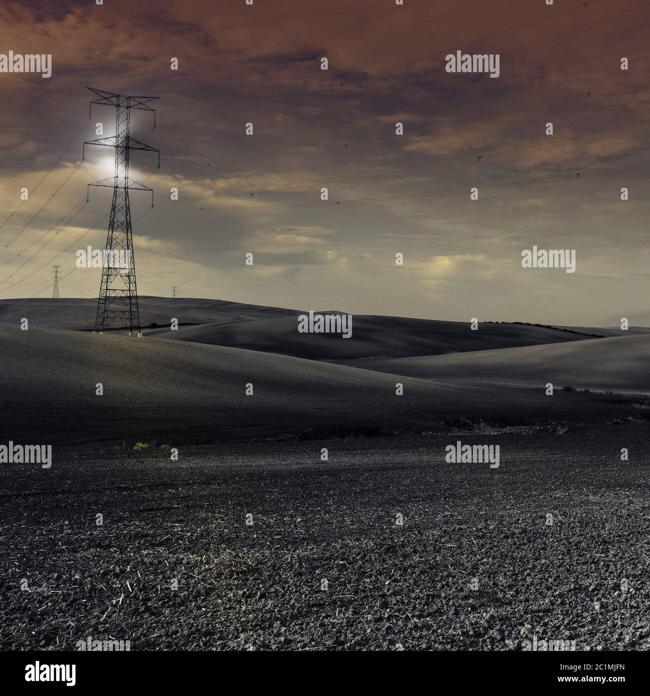 Electrical power lines in a mysterious light Stock Photo - Alamy