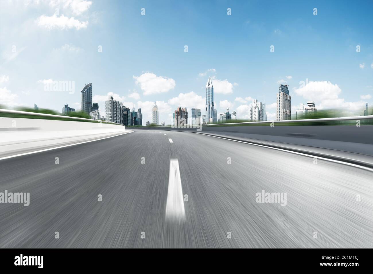 empty highway through modern city Stock Photo - Alamy