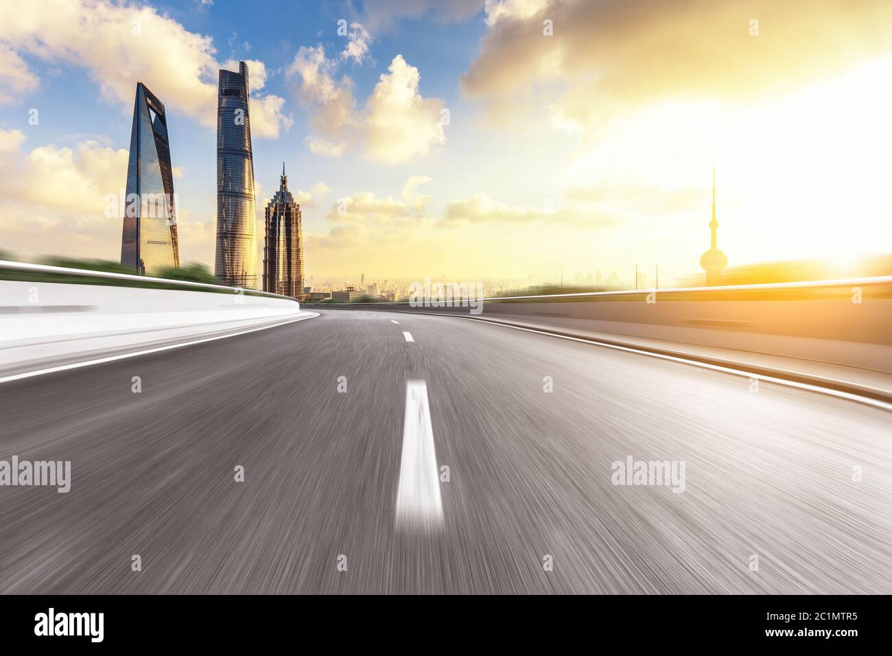 empty highway through modern city Stock Photo - Alamy