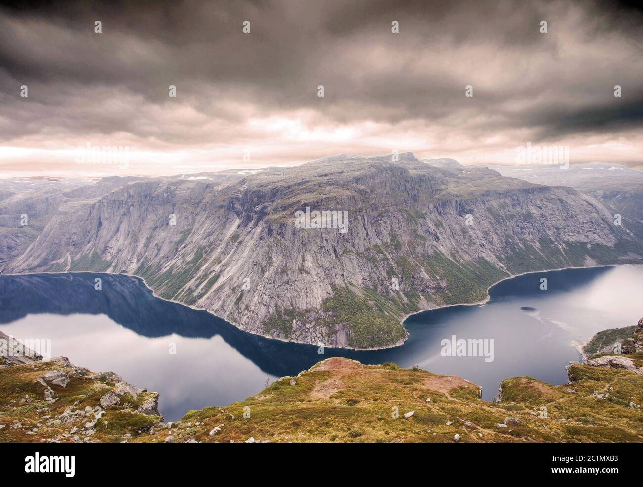 Rugged dramatic mountain landscape in norway cloudy dramatic day with ...
