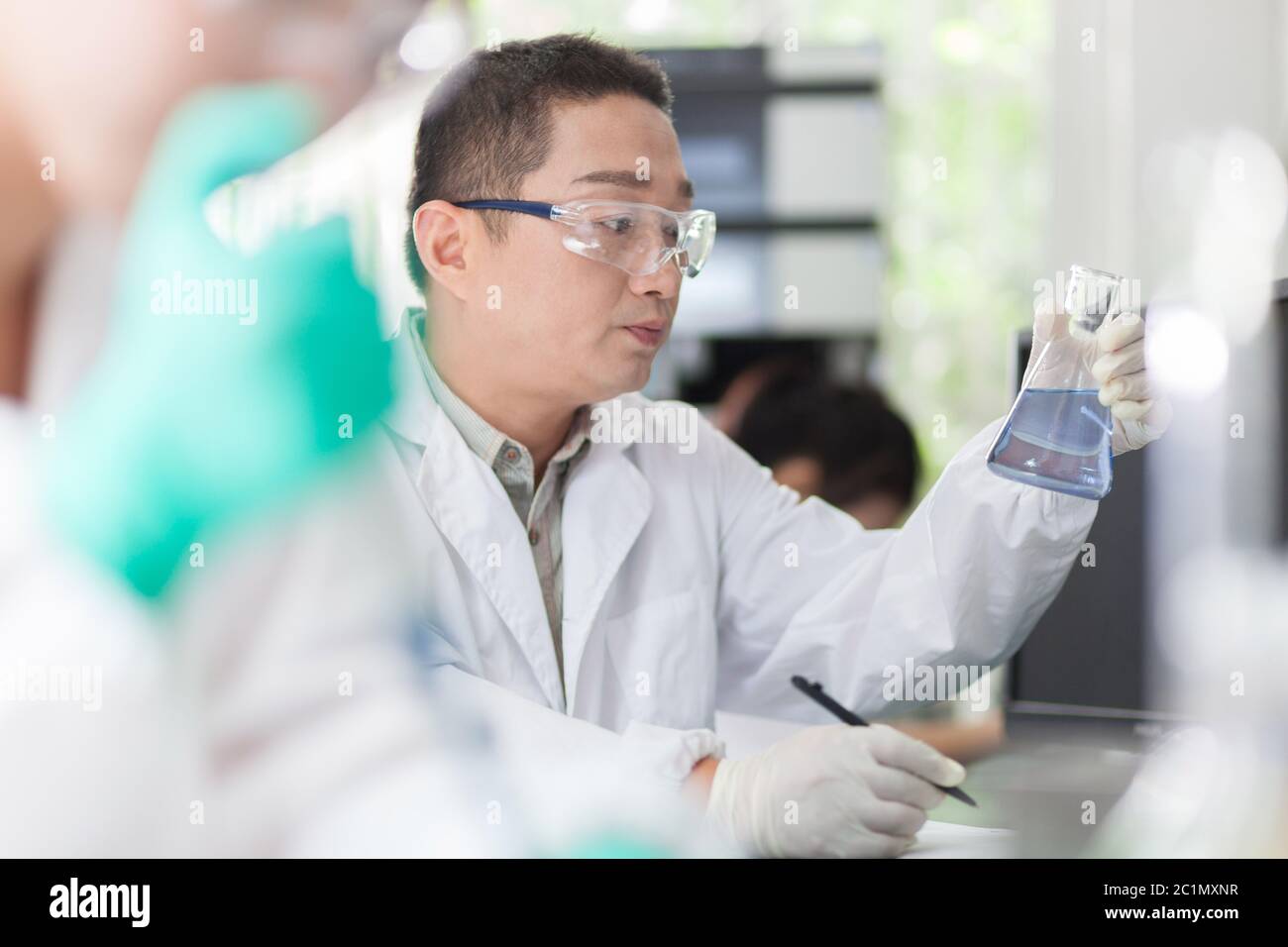people working at laboratory Stock Photo - Alamy