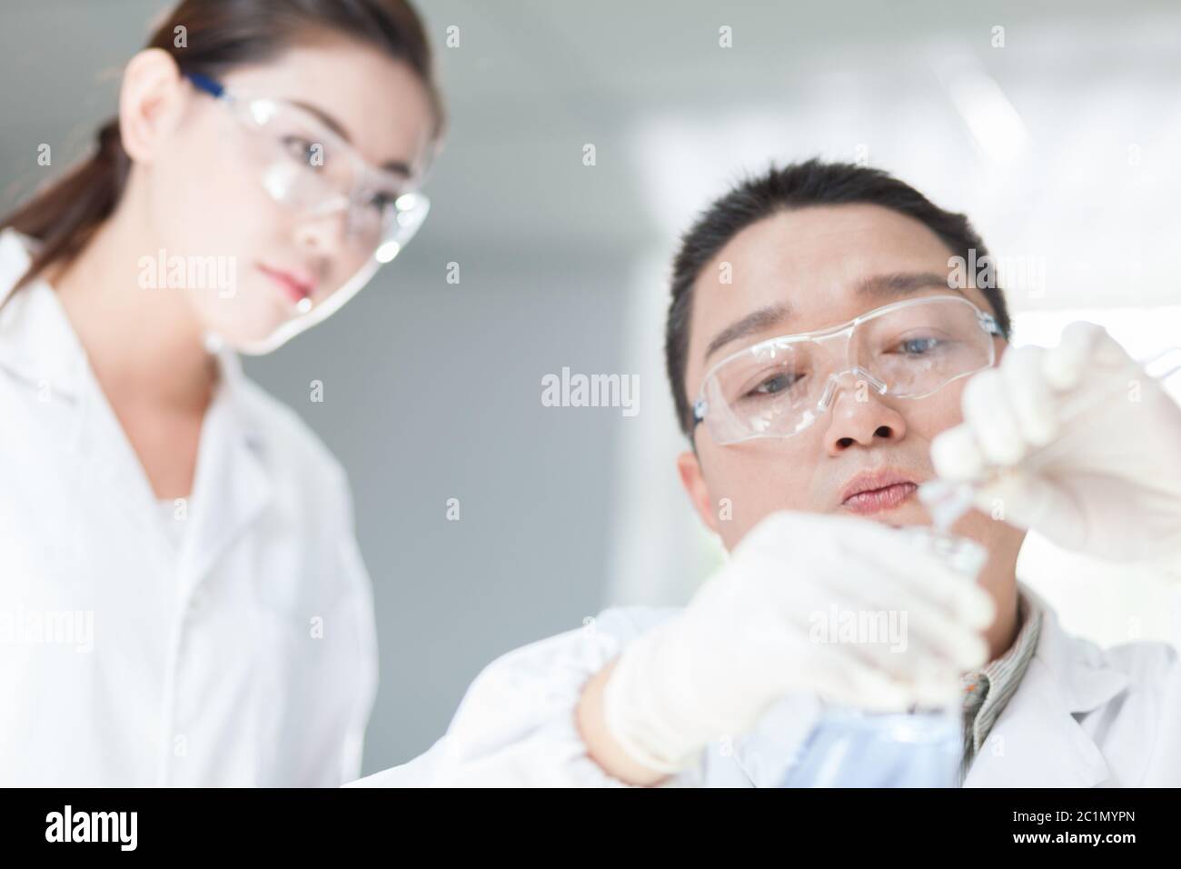 people working at laboratory Stock Photo - Alamy