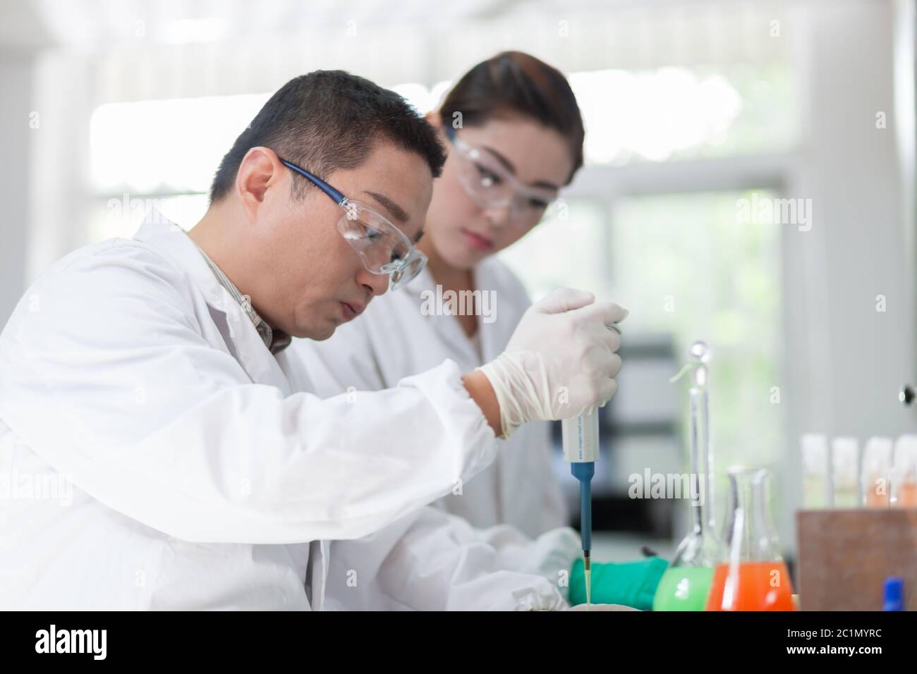 people working at laboratory Stock Photo - Alamy