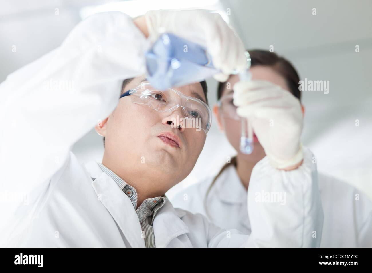 people working at laboratory Stock Photo - Alamy