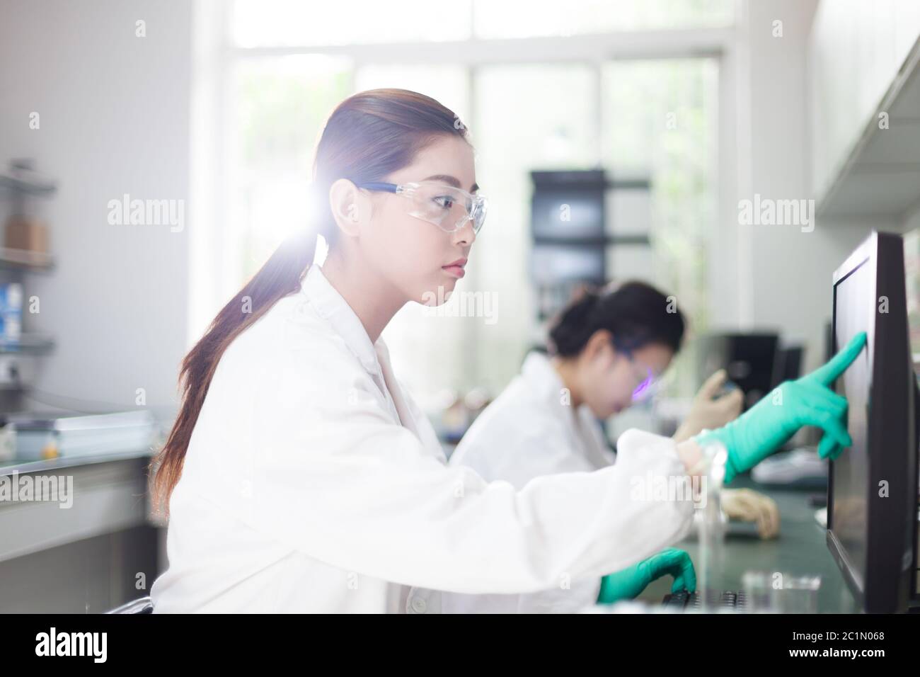people working at laboratory Stock Photo - Alamy