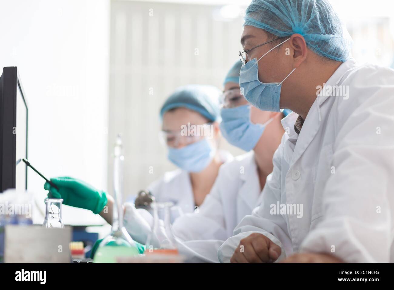 people working at laboratory Stock Photo - Alamy