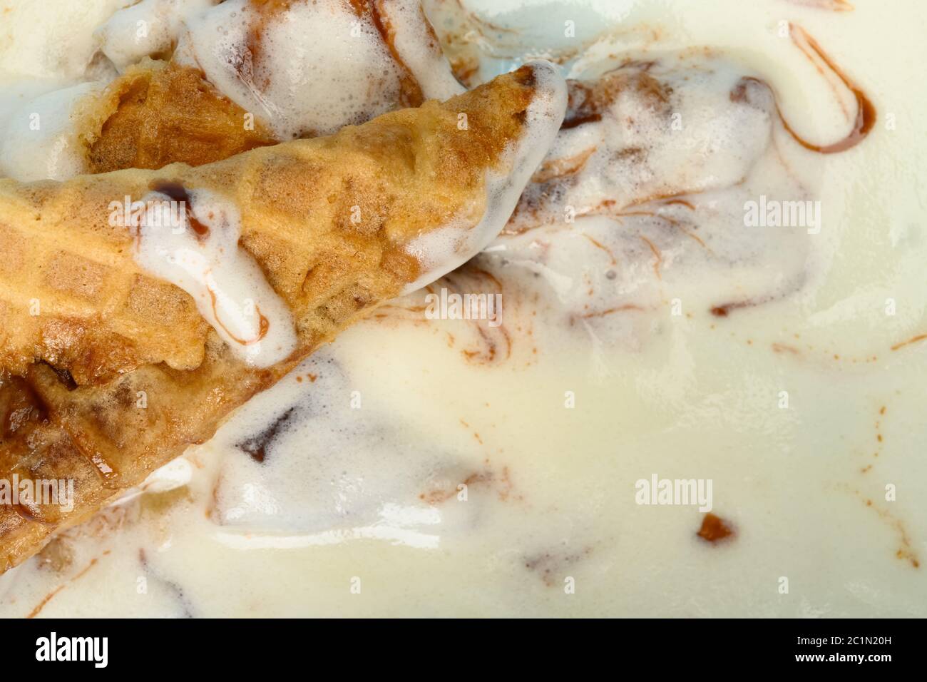 complete melted ice cream close up Stock Photo - Alamy