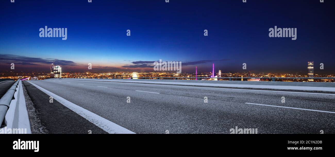 empty highway through modern city Stock Photo - Alamy