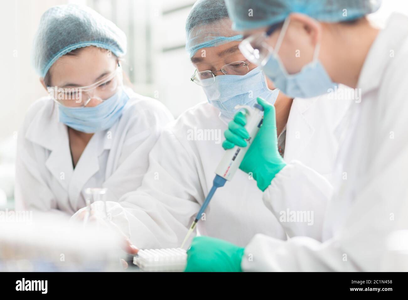 people working at laboratory Stock Photo - Alamy