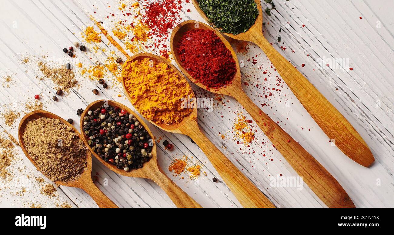 Creative layout of spoons with spices Stock Photo - Alamy