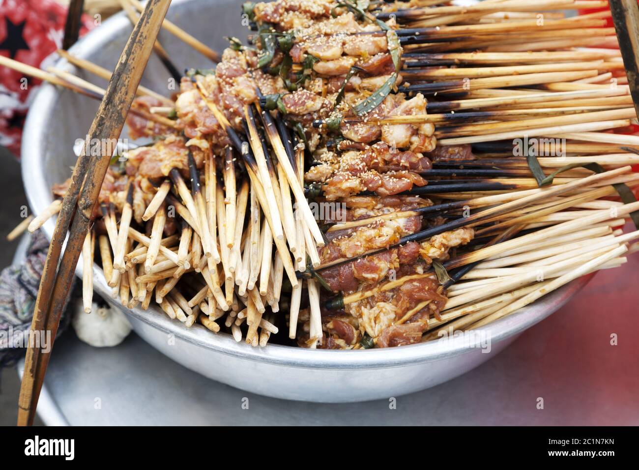 Small brochettes with cooked meat Stock Photo - Alamy