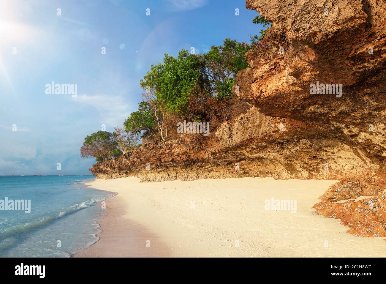 Luxury empty sandy beach under cliff Stock Photo - Alamy