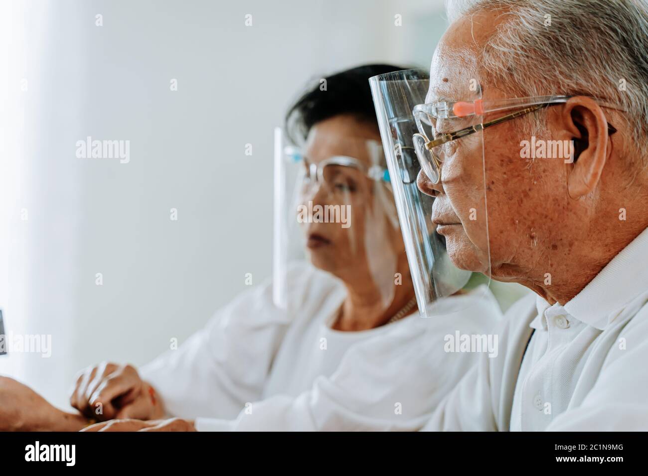 Man wear face shields hi-res stock photography and images - Alamy