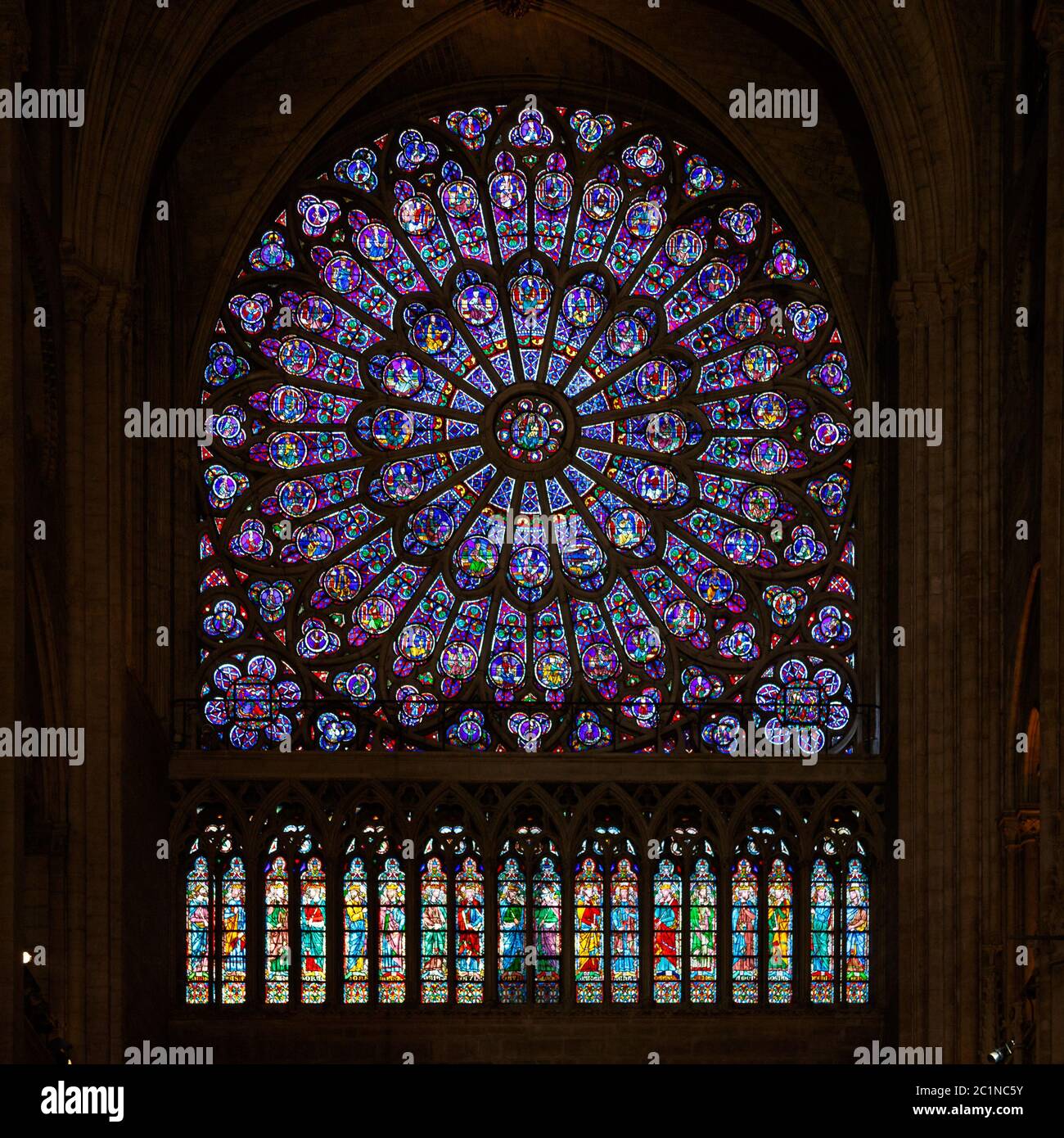 Paris, France, March 27 2017: Famous Notre Dame cathedral stained glass ...