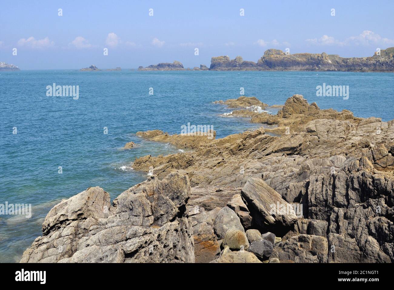 Rocky reef in the sea Stock Photo - Alamy