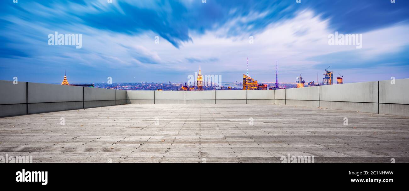 empty ground with modern cityscape new york at night Stock Photo - Alamy