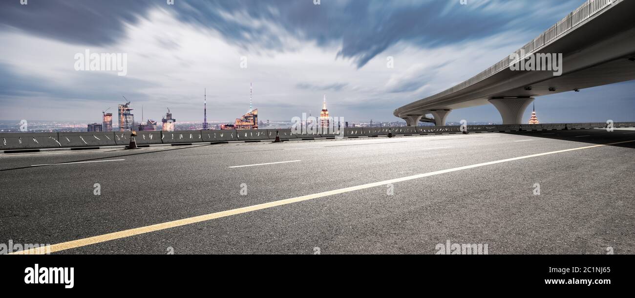 empty asphalt highway with modern cityscape new york Stock Photo - Alamy