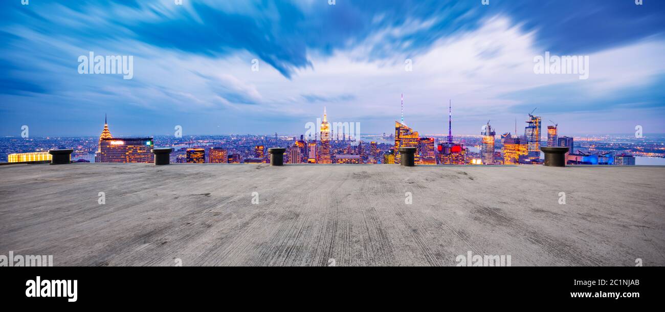 empty ground with modern cityscape new york at night Stock Photo - Alamy