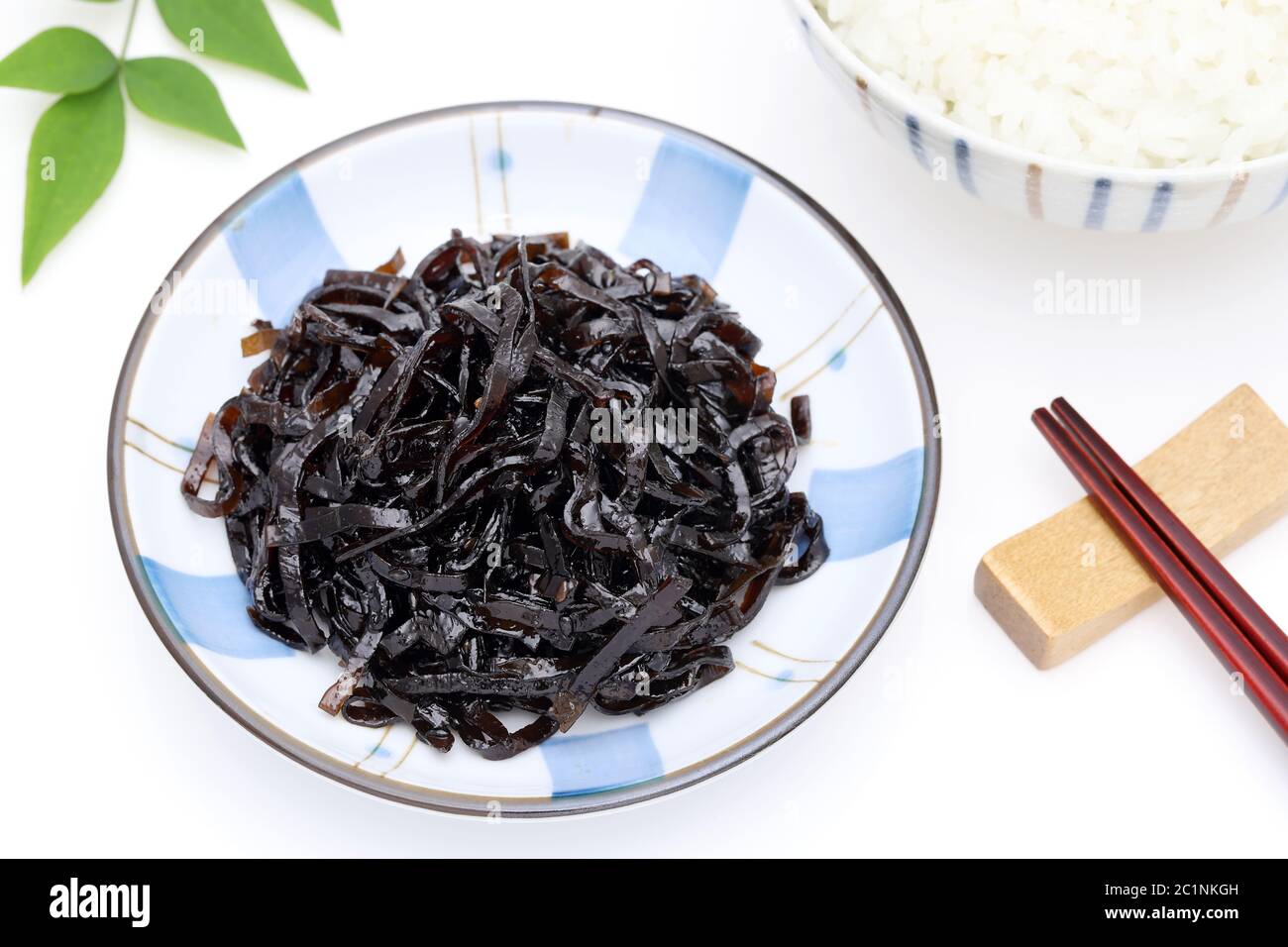Japanese tsukudani of konbu on white background Stock Photo - Alamy