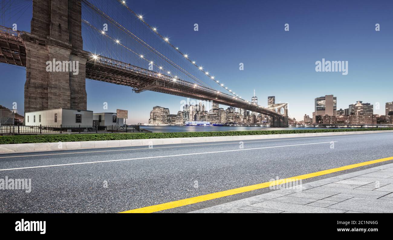 asphalt highway with cityscape of manhattan Stock Photo - Alamy