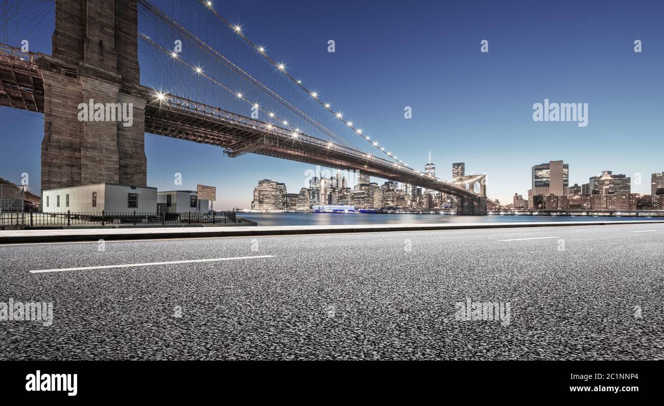 asphalt highway with cityscape of manhattan Stock Photo - Alamy