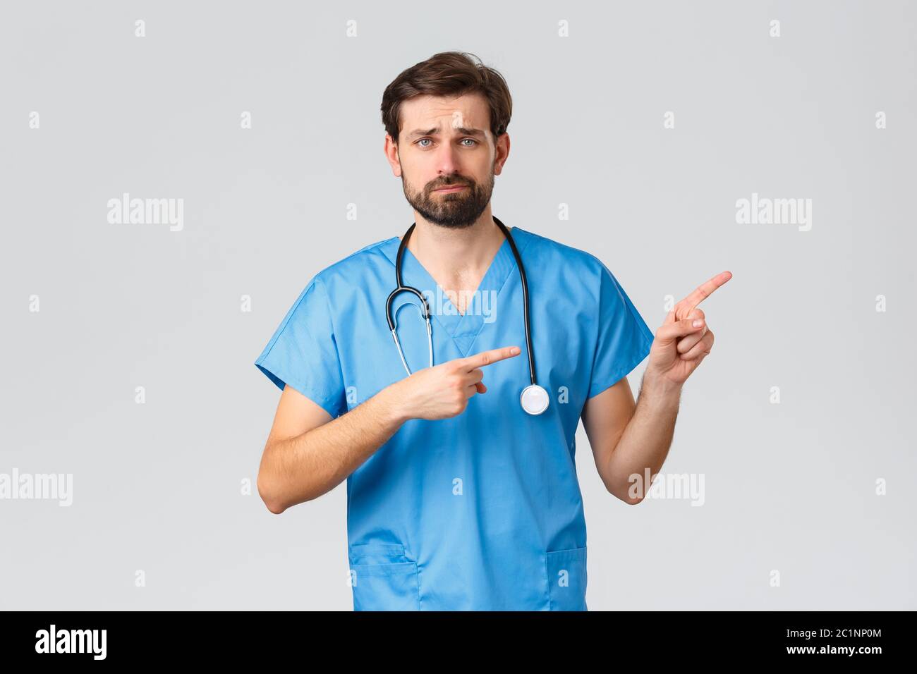 Healthcare workers, pandemic and coronavirus outbreak concept. Unamused ...