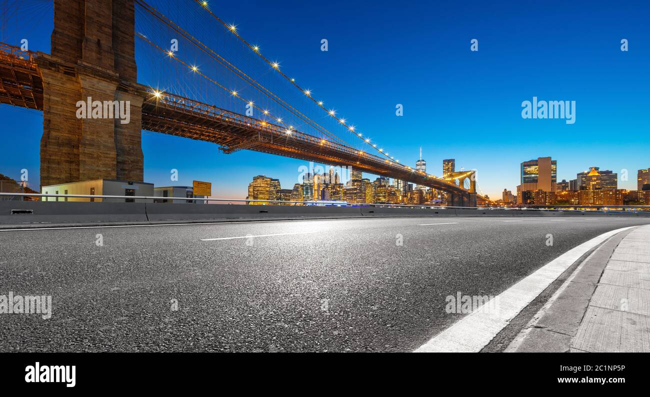 asphalt highway with cityscape of manhattan Stock Photo - Alamy