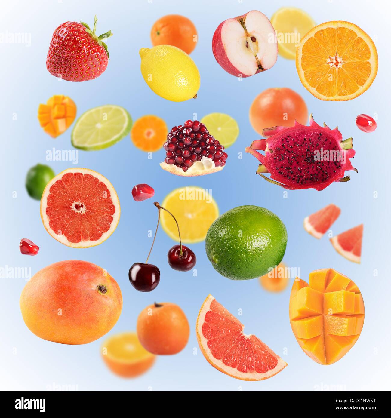 Collage of different fruits on a blue background Stock Photo - Alamy