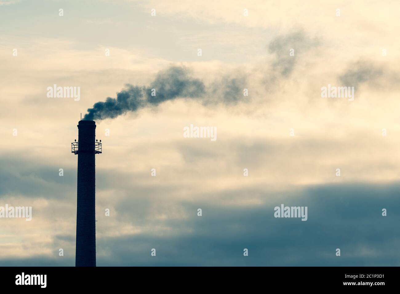 Smoke comes from factory pipe Stock Photo - Alamy