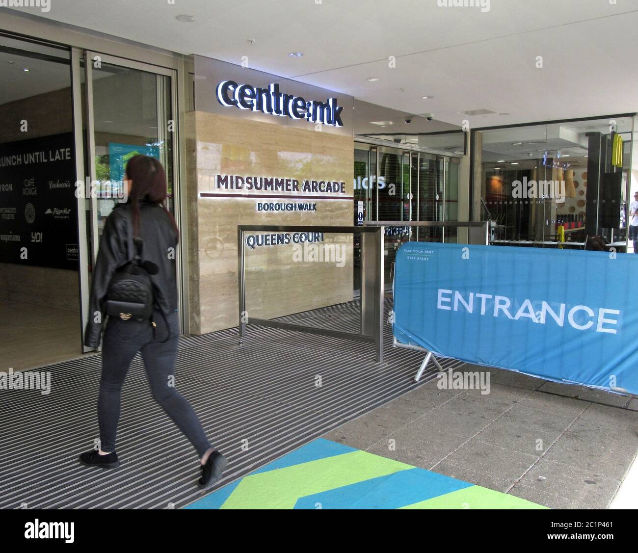 Milton Keynes, UK. 15th June, 2020. A woman walks through Centre:mk ...