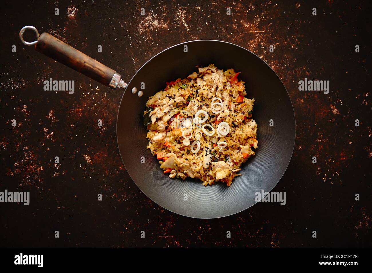 Traditional orginal fried spicy rice with chicken served in a round ...